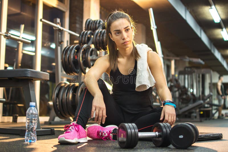 Young Woman Taking a Break in a Gym. Stock Photo - Image of training ...