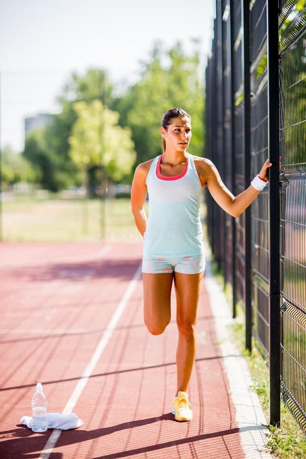 Young Woman Taking Exercise Stock Image - Image of lifestyle, exercise ...