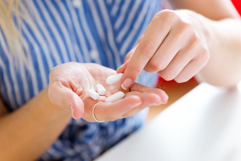 Young Woman Taking in Pill. Stock Photo - Image of doctor, medicine ...