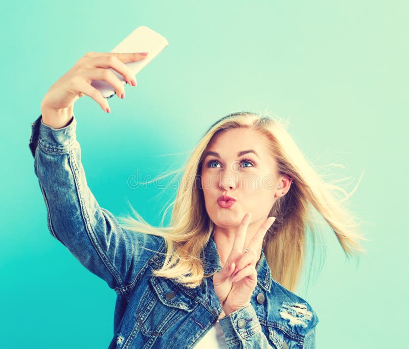 23,606 Young Woman Taking Selfie Smile Stock Photos - Free & Royalty ... 23,606 Young Woman Taking Selfie Smile Stock Photos - Free & Royalty ...