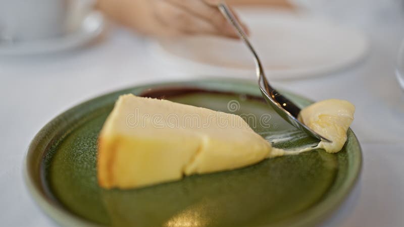 Young Woman Taking Slice from Cheesecake at the Restaurant Stock Photo ...