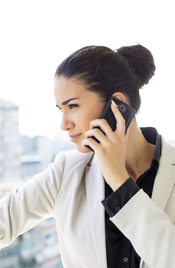 Young Woman Talking Over Phone Stock Image - Image of mobile, hair ...