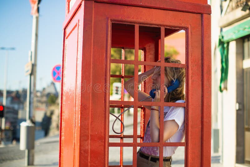 Young Woman Talking in a Phone Booth. Love. Stock Image - Image of ...