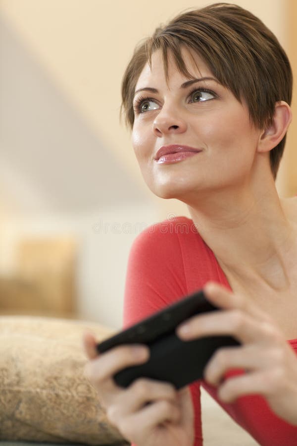 Young Woman Texting at Home Stock Photo - Image of cellphone, pretty ...