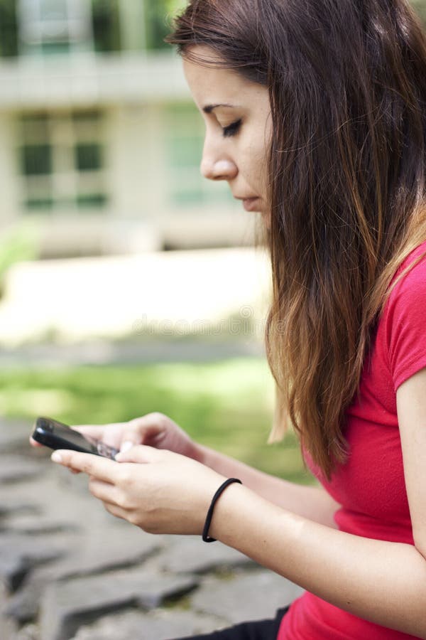 Young Woman Texting a Message Stock Image - Image of technology, young ...
