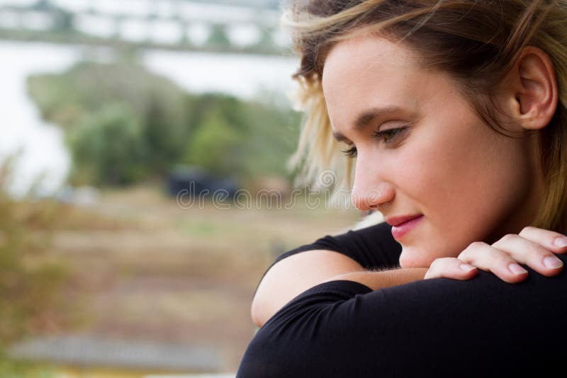 Young woman thinking stock image. Image of outside, lonely - 78198905