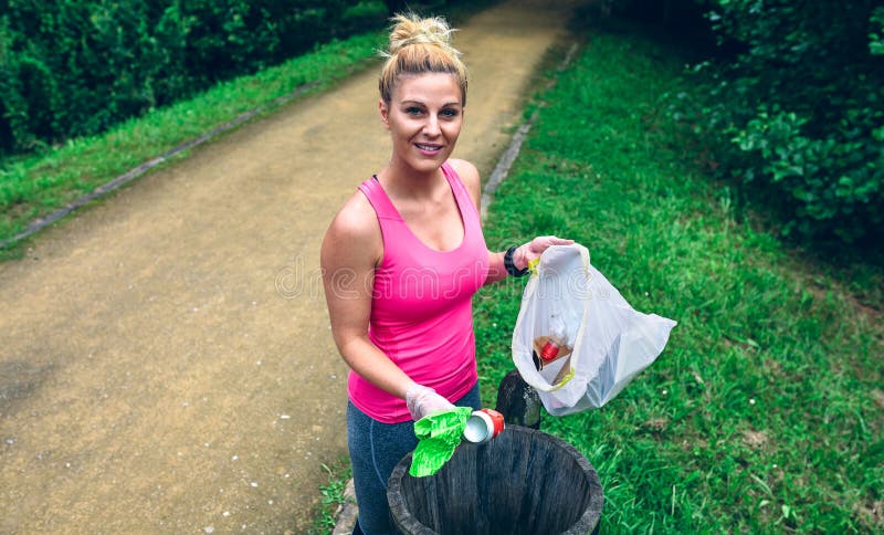 Woman Throwing Garbage after Plogging Stock Photo - Image of happy ...