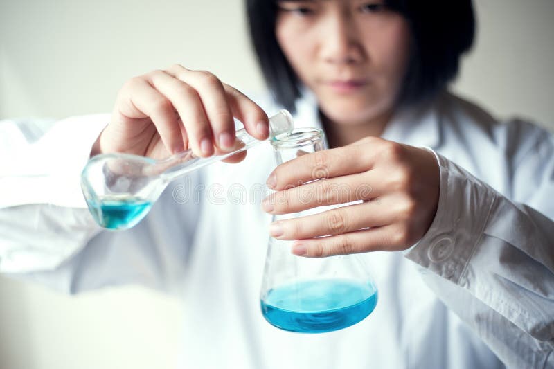 A Young Woman To Do Chemistry Experiments Stock Photo - Image of tests ...
