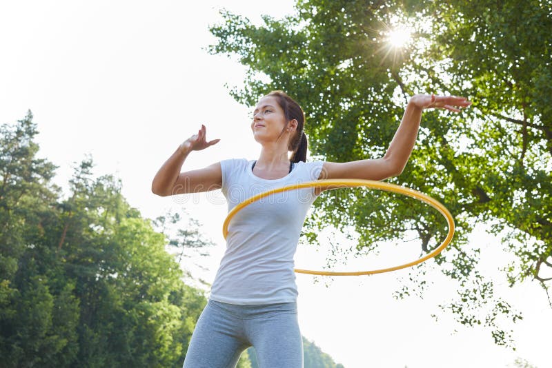 Young Woman Training with Hoop Stock Image - Image of rotate, people ...