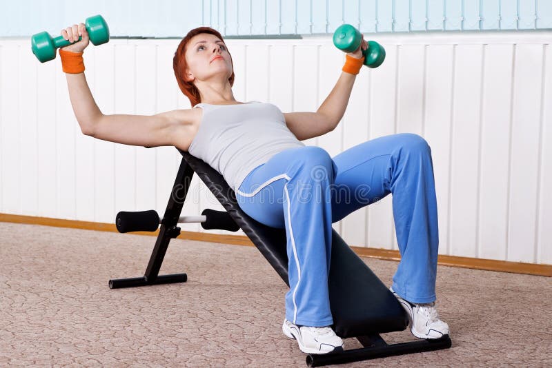 Young Woman Training for Muscle of Chest Stock Photo - Image of incline ...