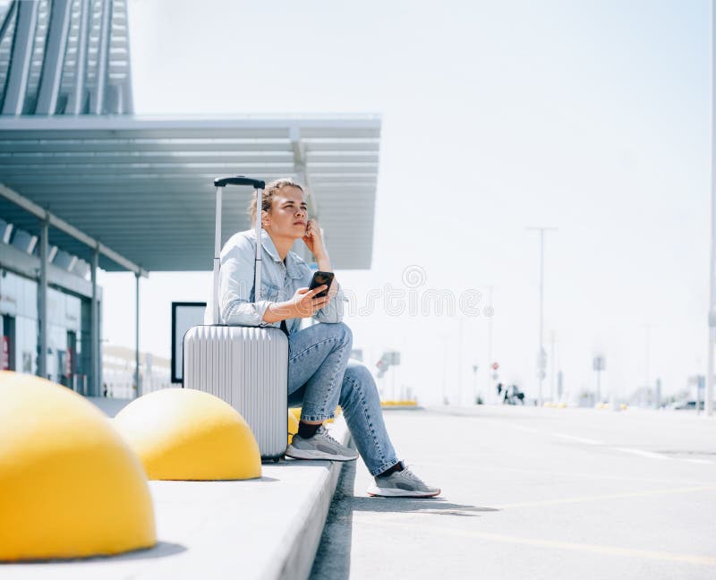 Young Woman Traveler At The Station Waiting For Taxi Stock Image Image Of Jeans Airport 1714