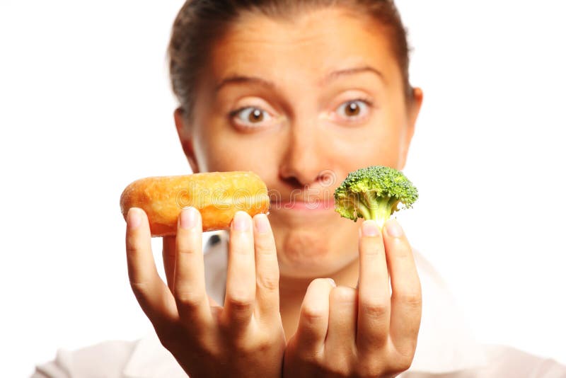 Young Woman Trying To Make Decission Stock Photo - Image of diet, happy ...