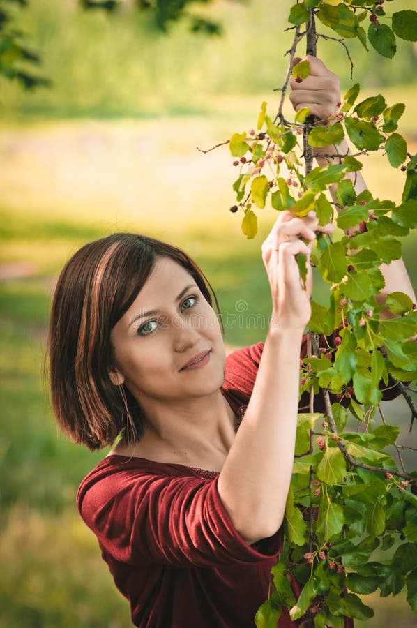 Young Woman with Twig of Mulberry Stock Photo - Image of portrait, lady ...