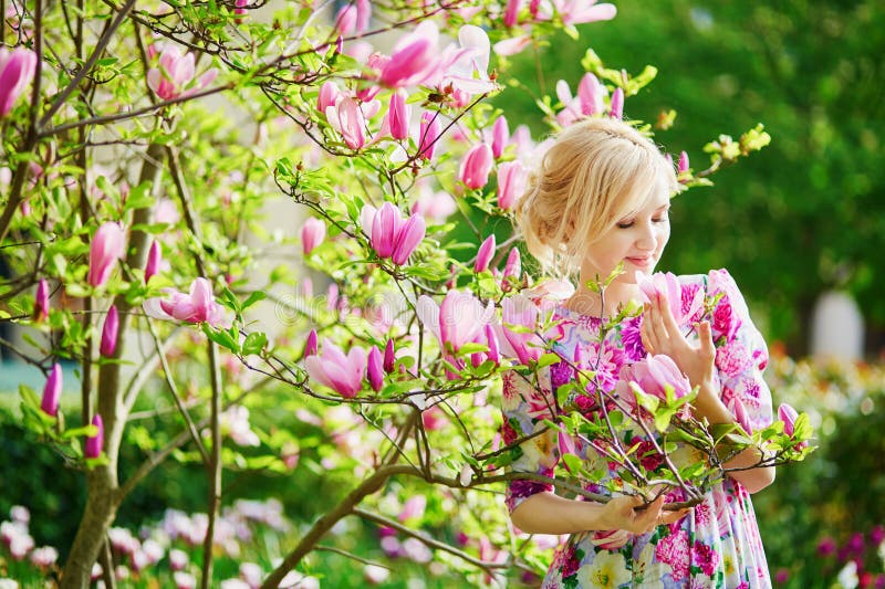 Young Woman Under Blooming Magnolia Tree on a Spring Day Stock Image ...