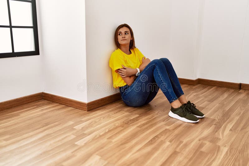 Young Woman Unhappy Sitting on Floor at Empty Room Stock Photo - Image ...