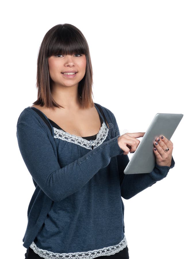 Young woman uses a tablet stock photo. Image of beautiful - 35977924