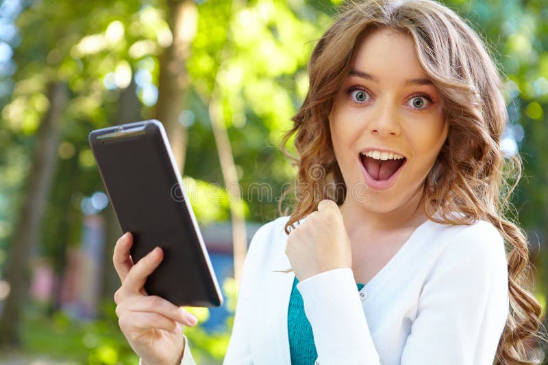 Young Woman Uses Tablet Pc. Stock Image - Image of ebook, tablet: 39650385