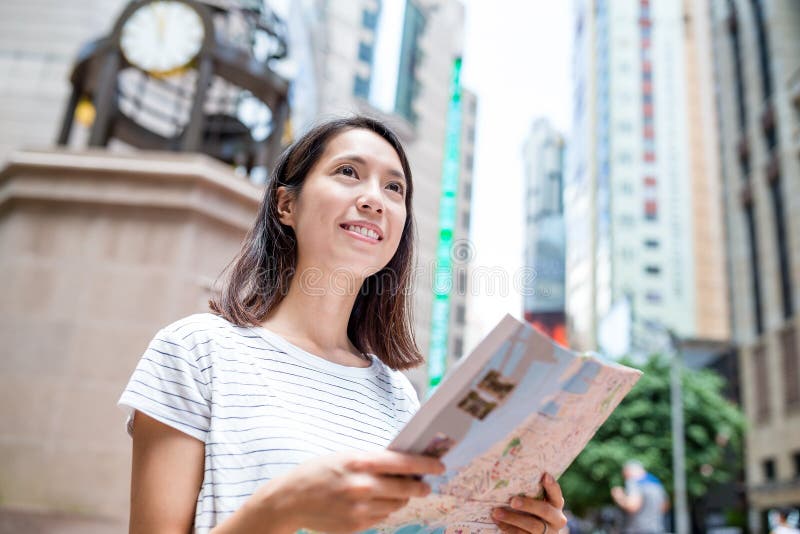 Young Woman Using City Guide in Hong Kong Stock Photo - Image of ...