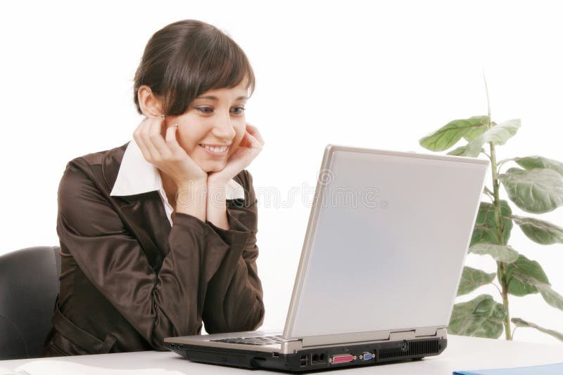 Young woman using computer stock photo. Image of laptop - 76708326