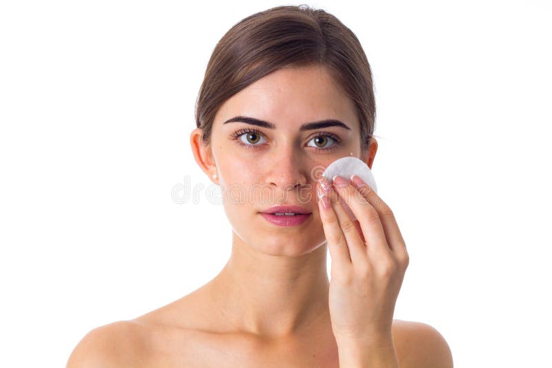 Young Woman Using Cotton Pads Stock Photo - Image of face, hand: 79548142
