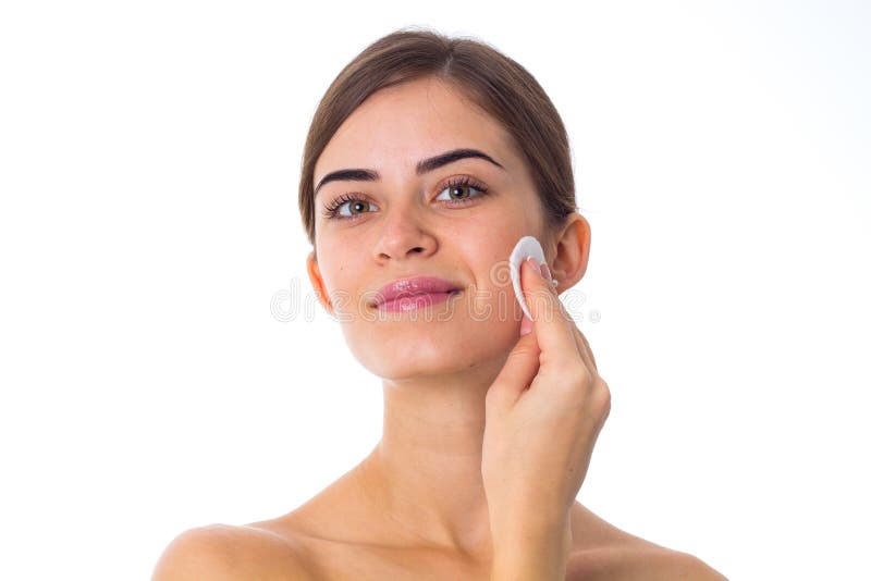 Young Woman Using Cotton Pads Stock Photo - Image of clean, ponytail ...