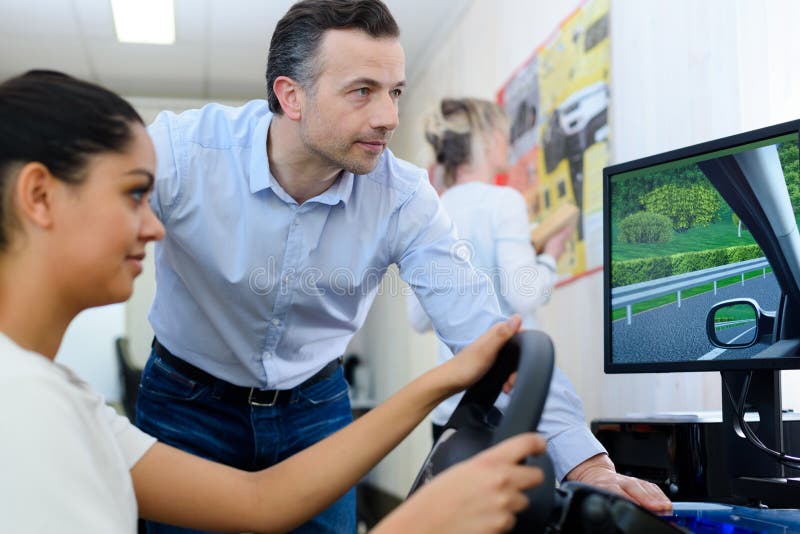 Young Woman Using Driving Simulator Stock Photo - Image of landscapes ...
