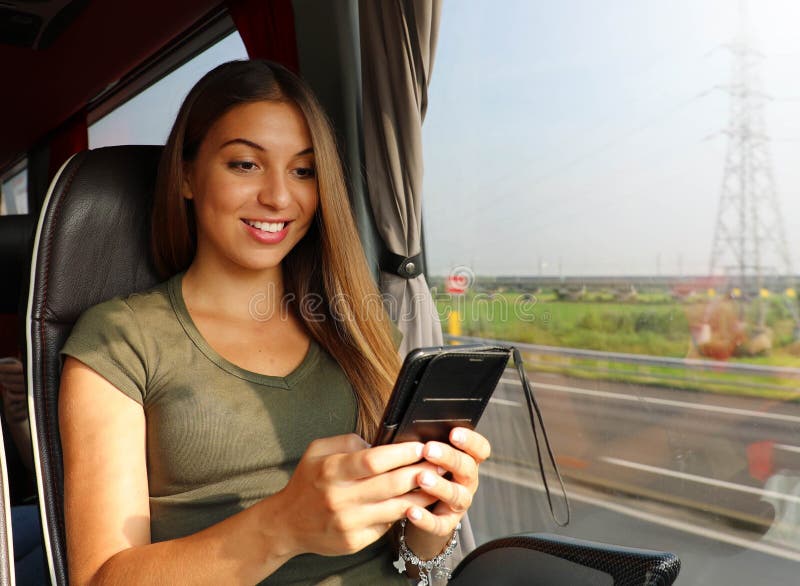 Young Woman Using Her Smartphone on the Bus Stock Image - Image of ...