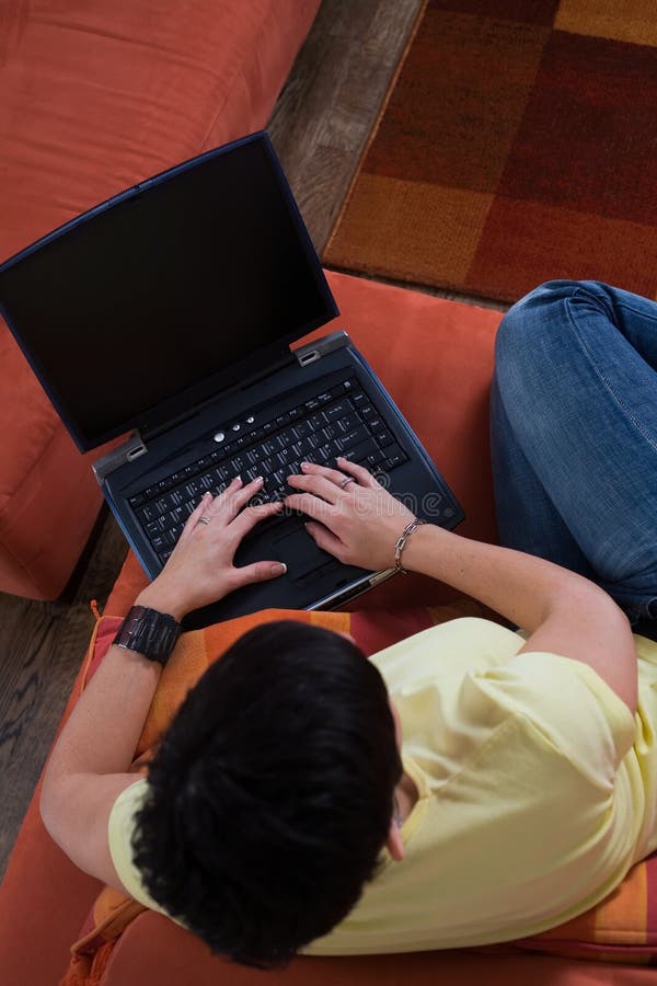 Young Woman is Using a Laptop Stock Photo - Image of connectivity ...