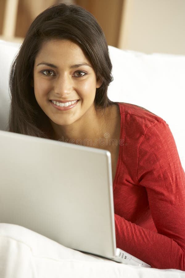 Young Woman Using Laptop at Home Stock Image - Image of attractive ...