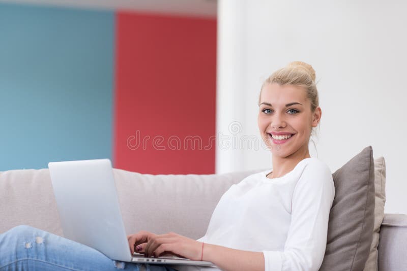 Young Woman Using Laptop at Home Stock Image - Image of luxury ...