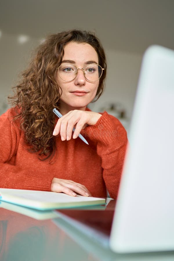 Young Woman Using Laptop Looking at Computer Elearning Watching Webinar ...
