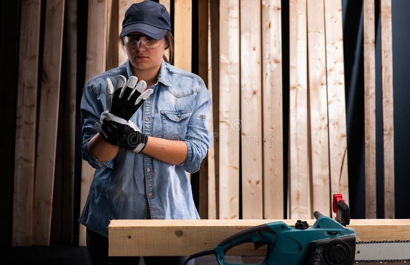 Young Woman Using Modern Electric Saw in the Workshop Stock Image ...