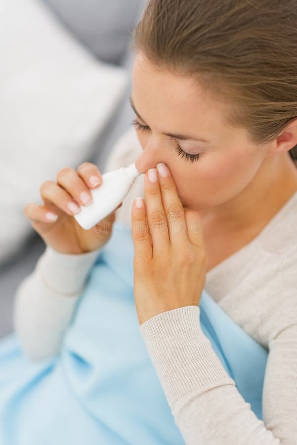 Young Woman Using Nose Drops Stock Image - Image of symptoms, drops ...