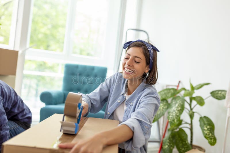 Woman packing boxes stock image. Image of duct, love - 173115665
