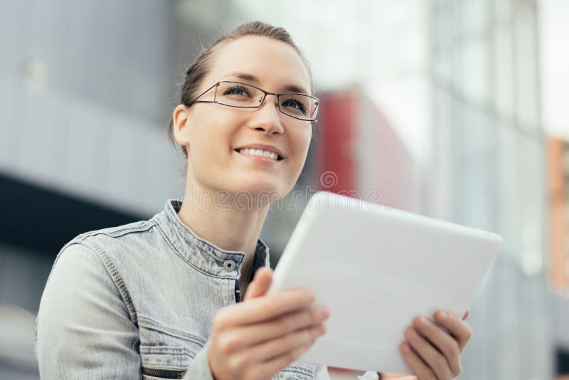 Young Woman Using Tablet Computer Outdoor in a City Stock Photo - Image ...