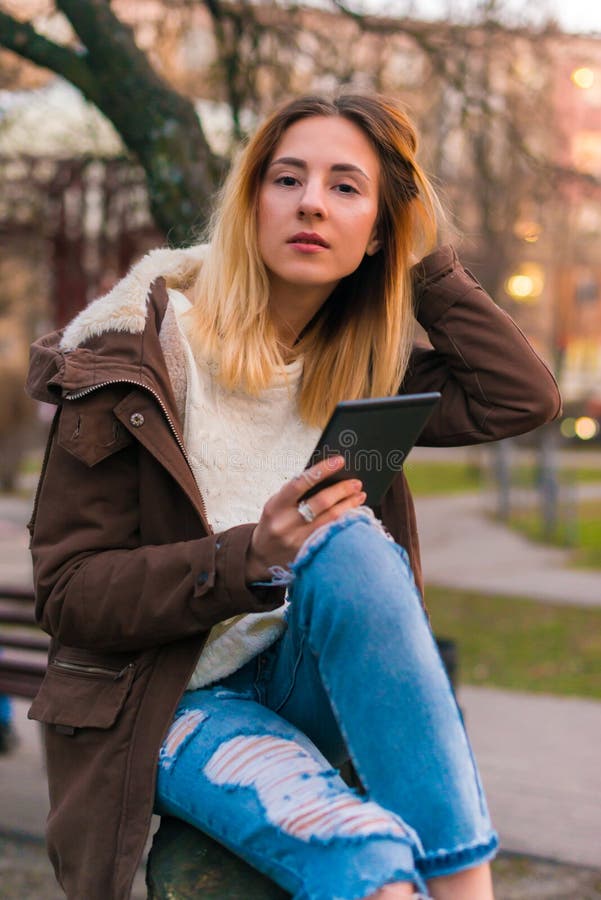 Young Woman Using Tablet Outdoor Smiling Stock Photo - Image of people ...
