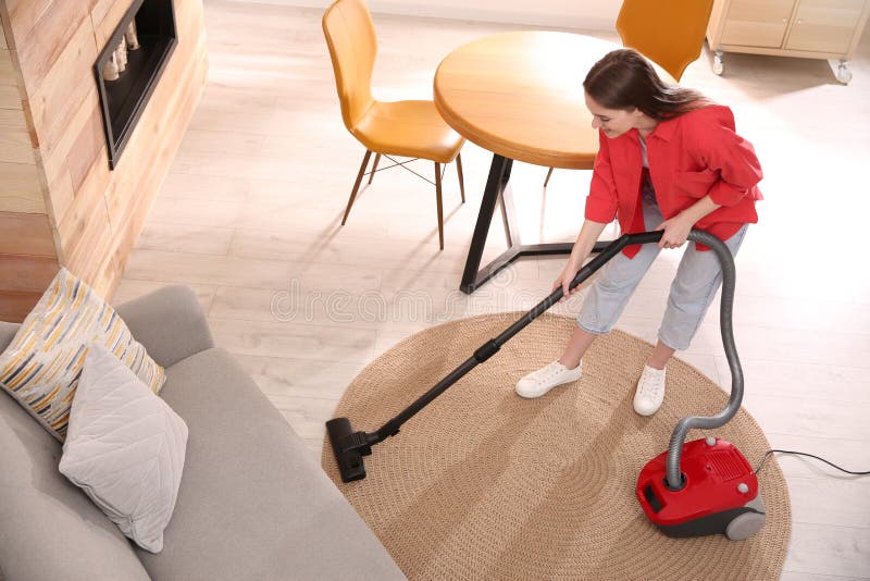 Young Woman Using Vacuum Cleaner Stock Image - Image of clean, cleaner ...