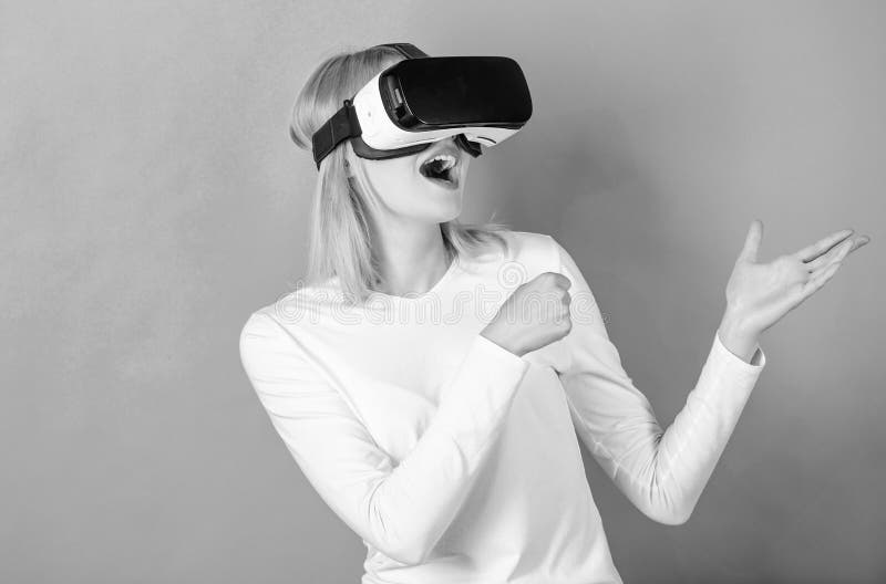 Young Woman Using a Virtual Reality Headset with Conceptual Network ...