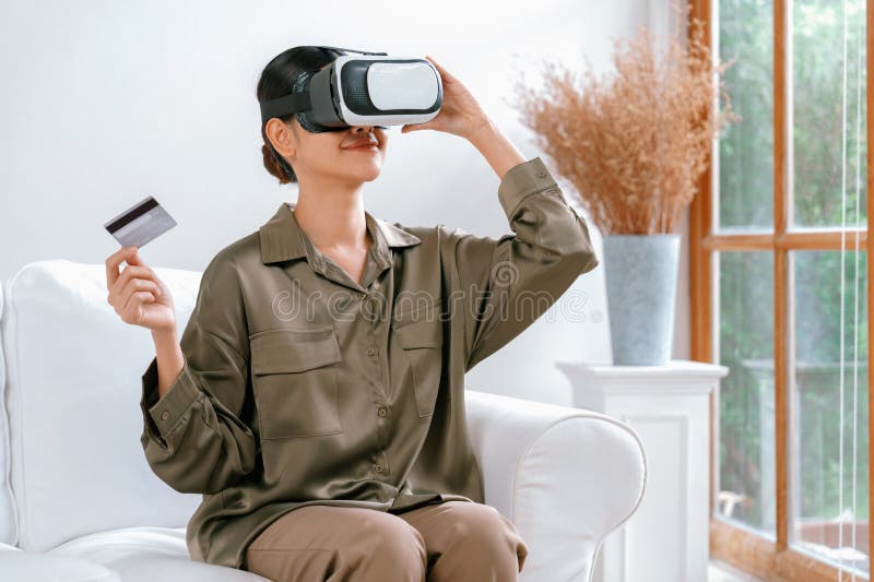 Young Woman Using Virtual Reality VR Goggle at Home for Uttermost ...