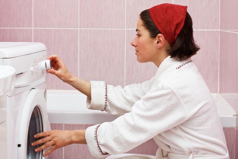 Young Woman Using Washing Machine Stock Image - Image of chores ...