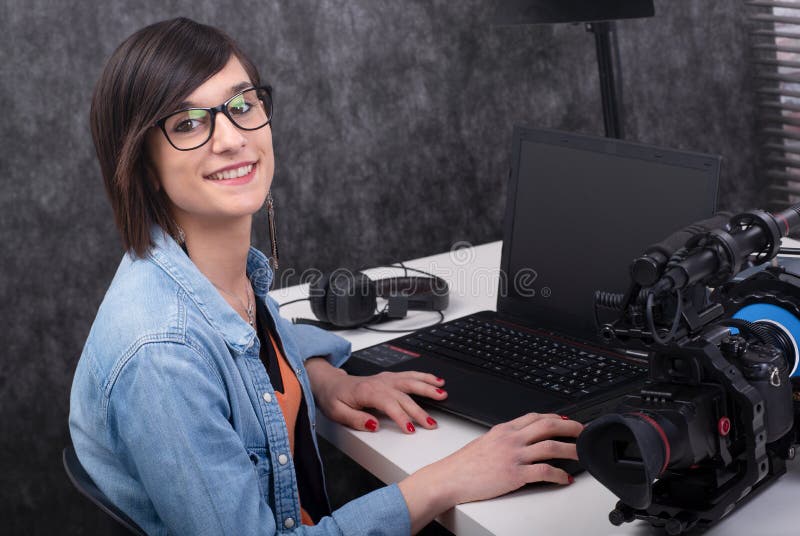 Young Woman Video Editor Working in Studio Stock Image - Image of desk ...