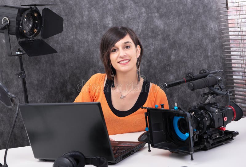 Woman Video Editor and Young Assistant Using Graphic Tablet Stock Photo ...