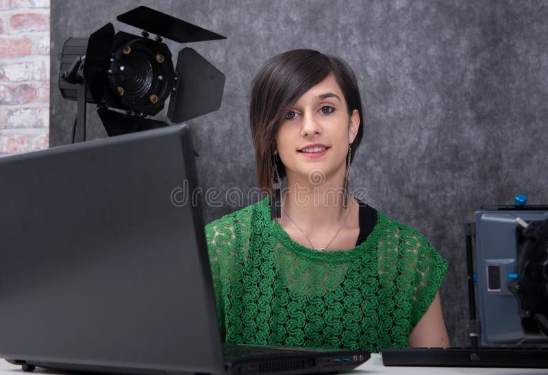 Woman Video Editor and Young Assistant Using Graphic Tablet Stock Photo ...