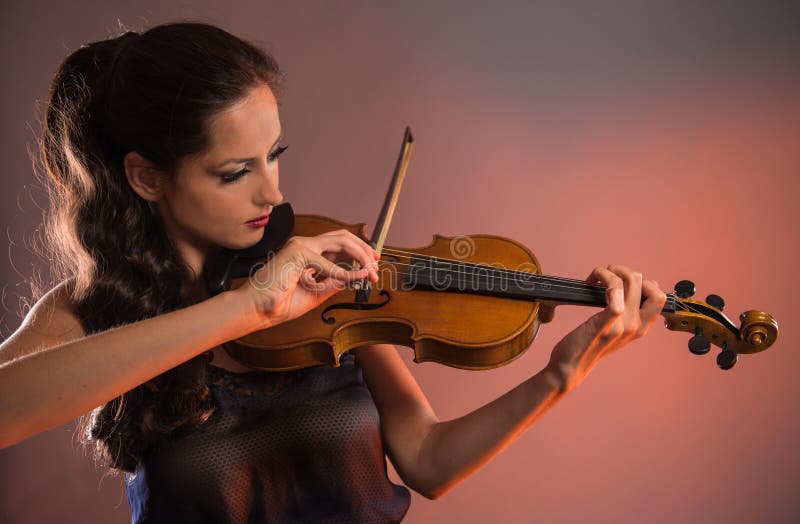 Young woman with violin stock image. Image of play, concerto - 52781097