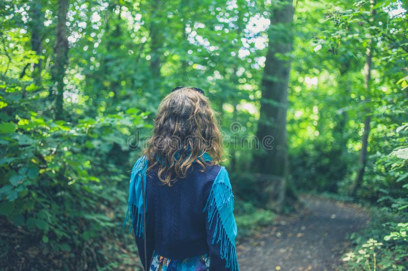 Young Woman Walking in Forest Stock Photo - Image of trees, kingdom ...