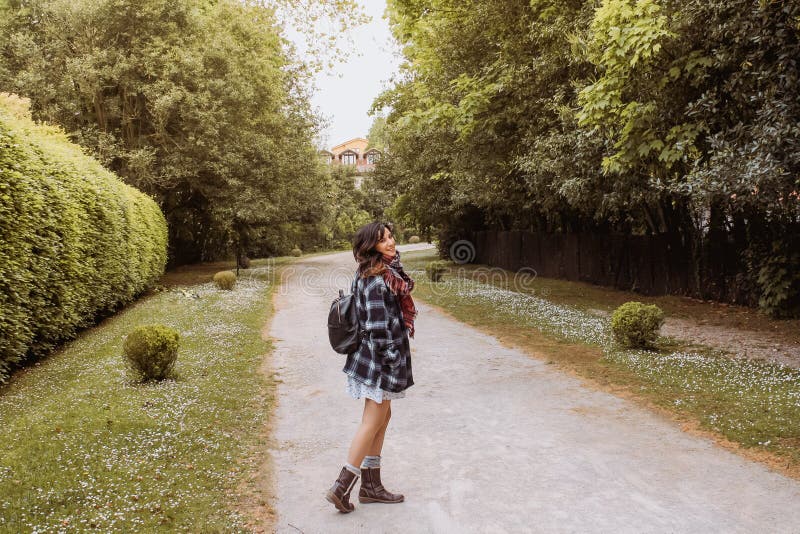 Young Woman Walking on a Path among Daisies Stock Image - Image of ...