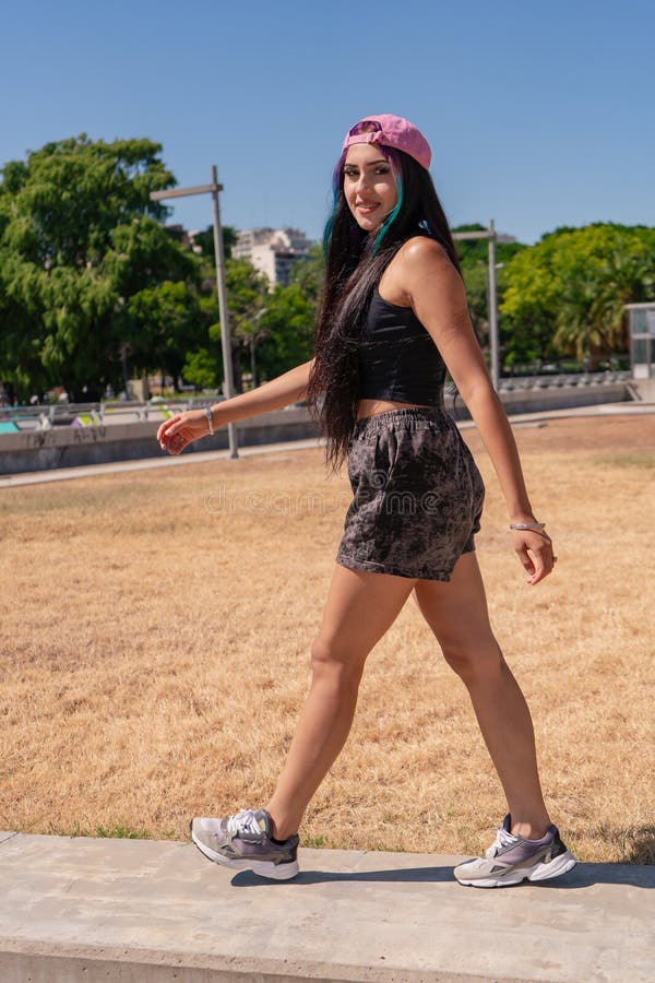 Young Woman Walking Sidewalk Next Building Stock Photos - Free ...
