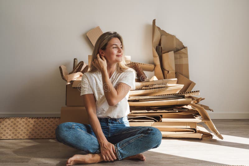Young Woman Wand Stack of Cardboard Waste at Home. Concepts of Paper ...