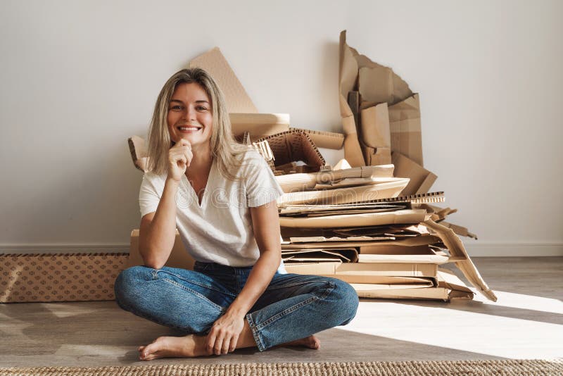 Young Woman Wand Stack of Cardboard Waste at Home. Concepts of Paper ...