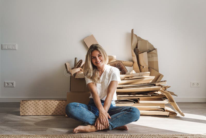 Young Woman Wand Stack of Cardboard Waste at Home. Concepts of Paper ...